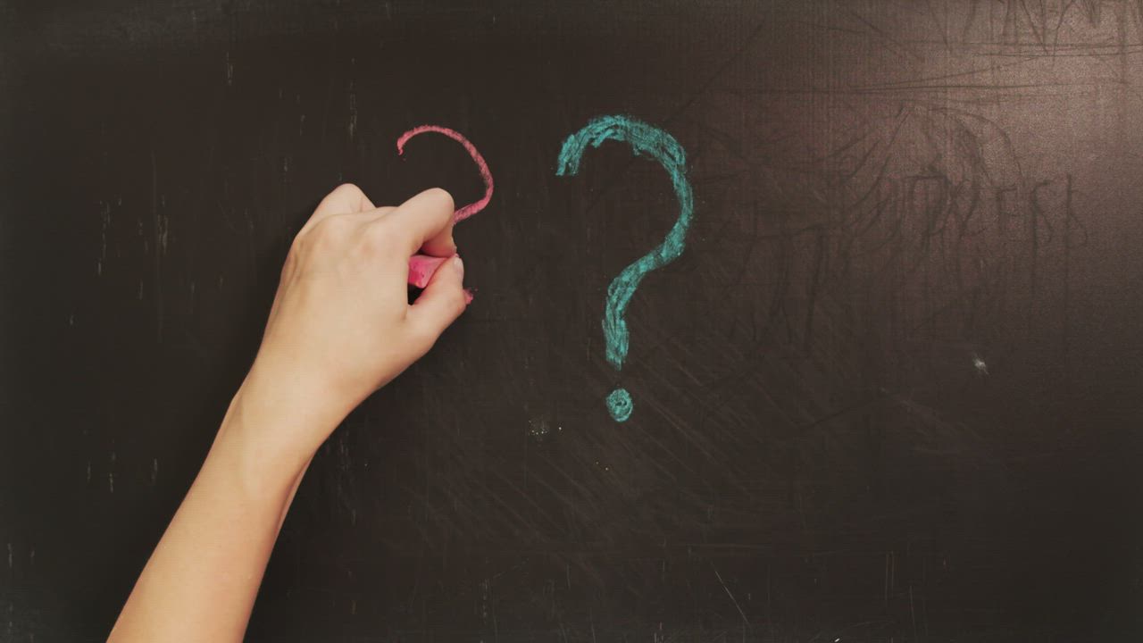 Person draws colourful question marks on a blackboard with chalk - Free ...
