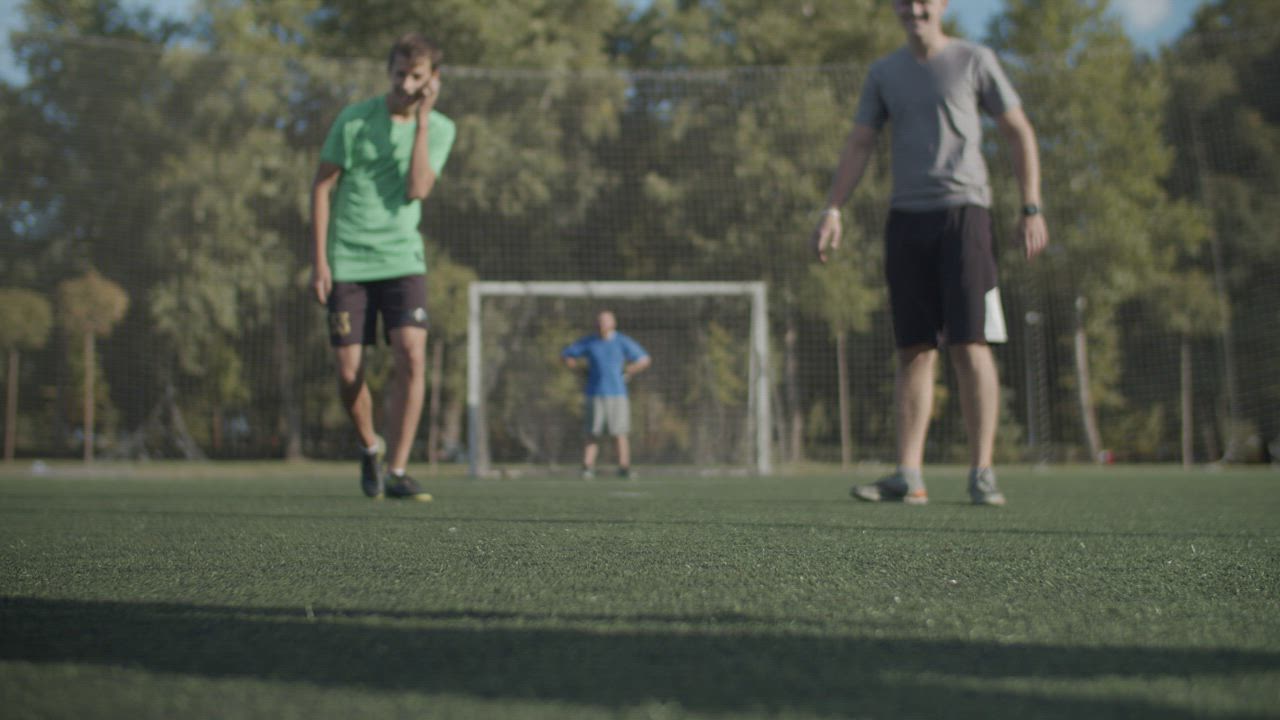 Soccer players playing on a field - Free Stock Video