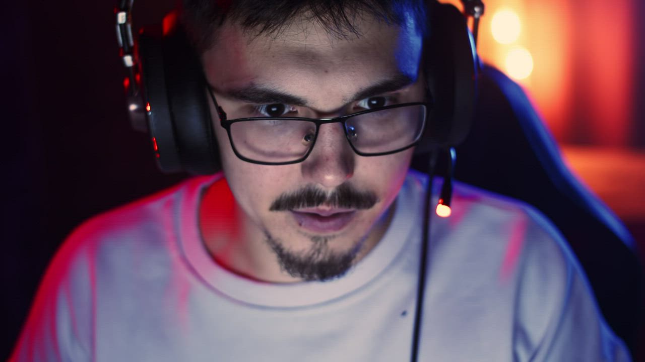 Gamer screaming at the screen while playing an online game - Free Stock ...