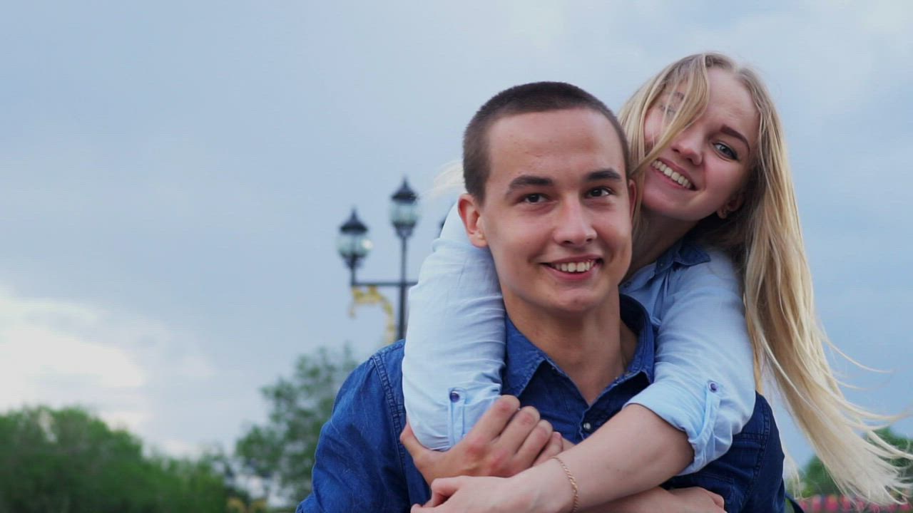 Boyfriend spinning his partner in a circle on a date - Free Stock Video