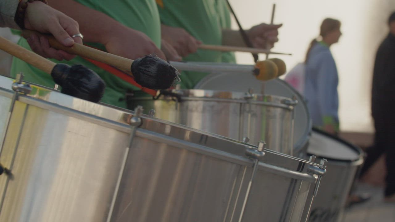 Marching band drummers participating in a march - Free Stock Video
