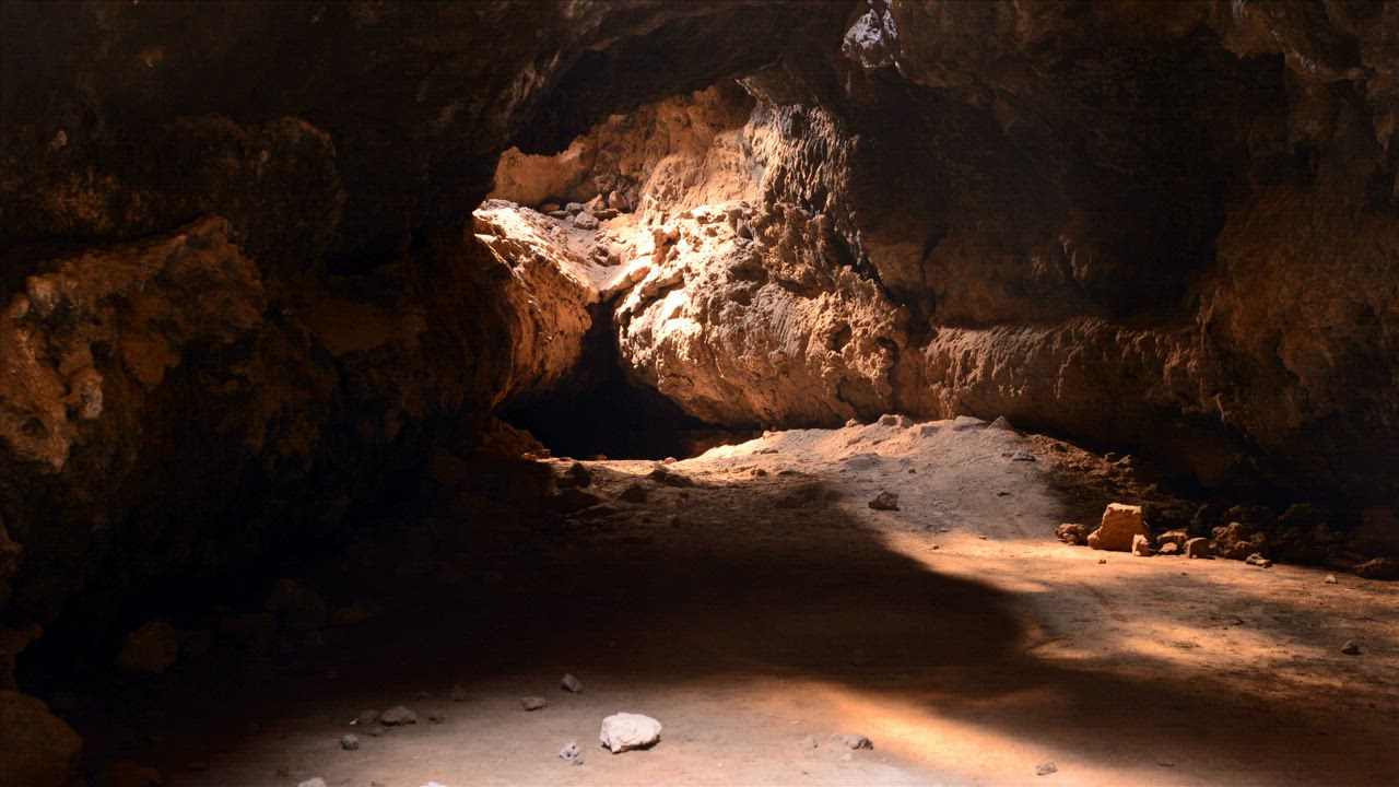Light rays inside of a cave - Free Stock Video