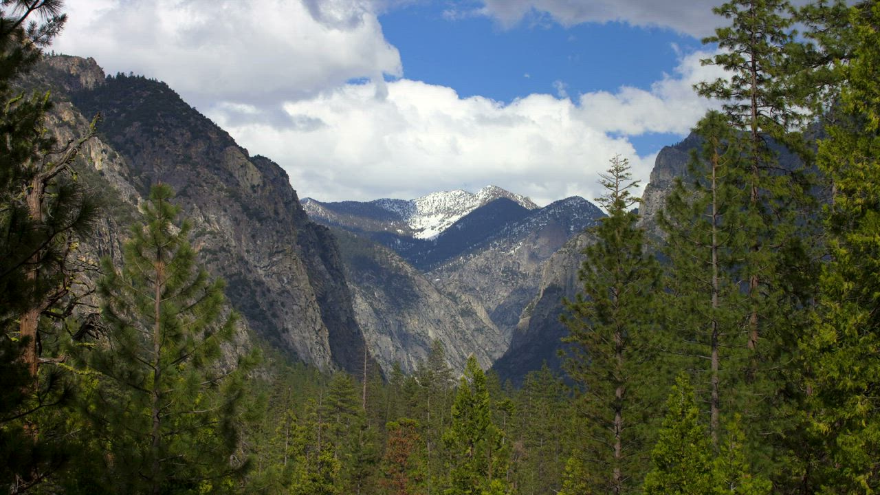 Time lapse of clouds over a canyon - Free Stock Video
