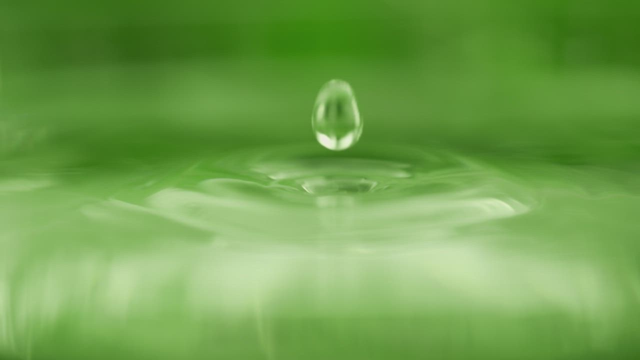 Slow motion of a drop falling - Free Stock Video