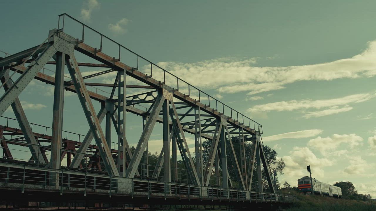 Train passing over a bridge - Free Stock Video