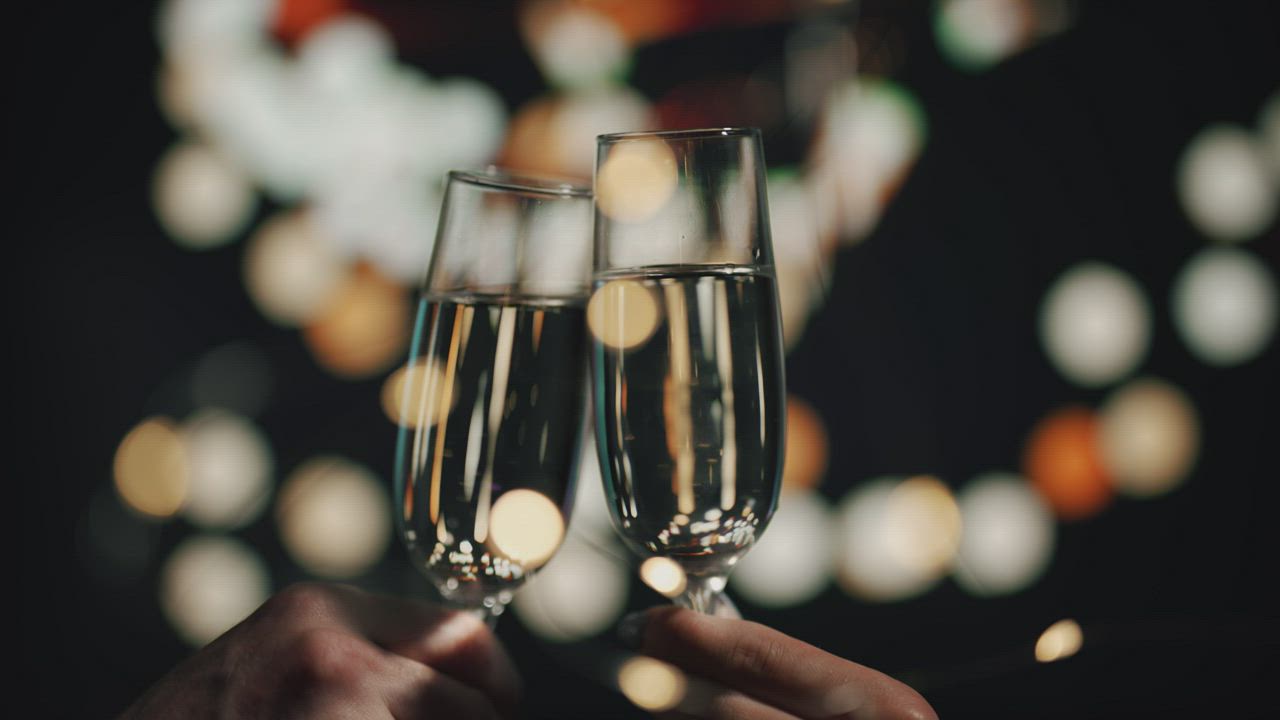 Clinking glasses of champagne - Free Stock Video