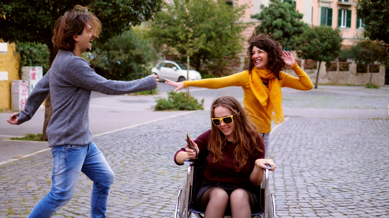 Friends dancing in the street and hug - Free Stock Video