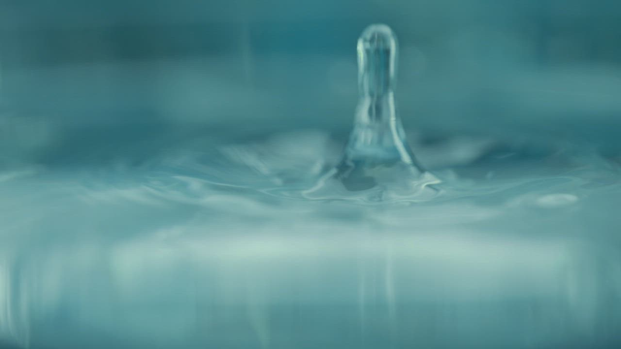 Slow motion a water drop - Free Stock Video