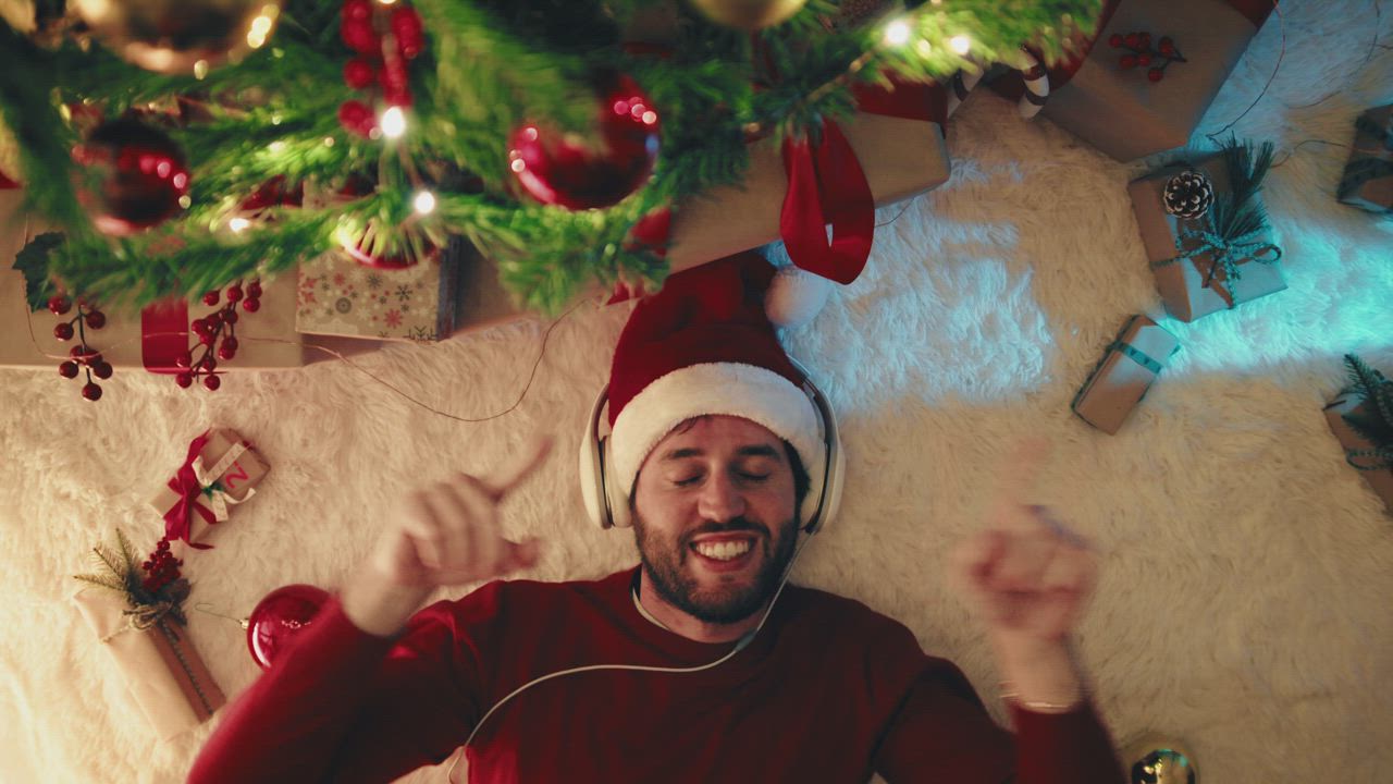 Happy man dances because Christmas is approaching - Free Stock Video