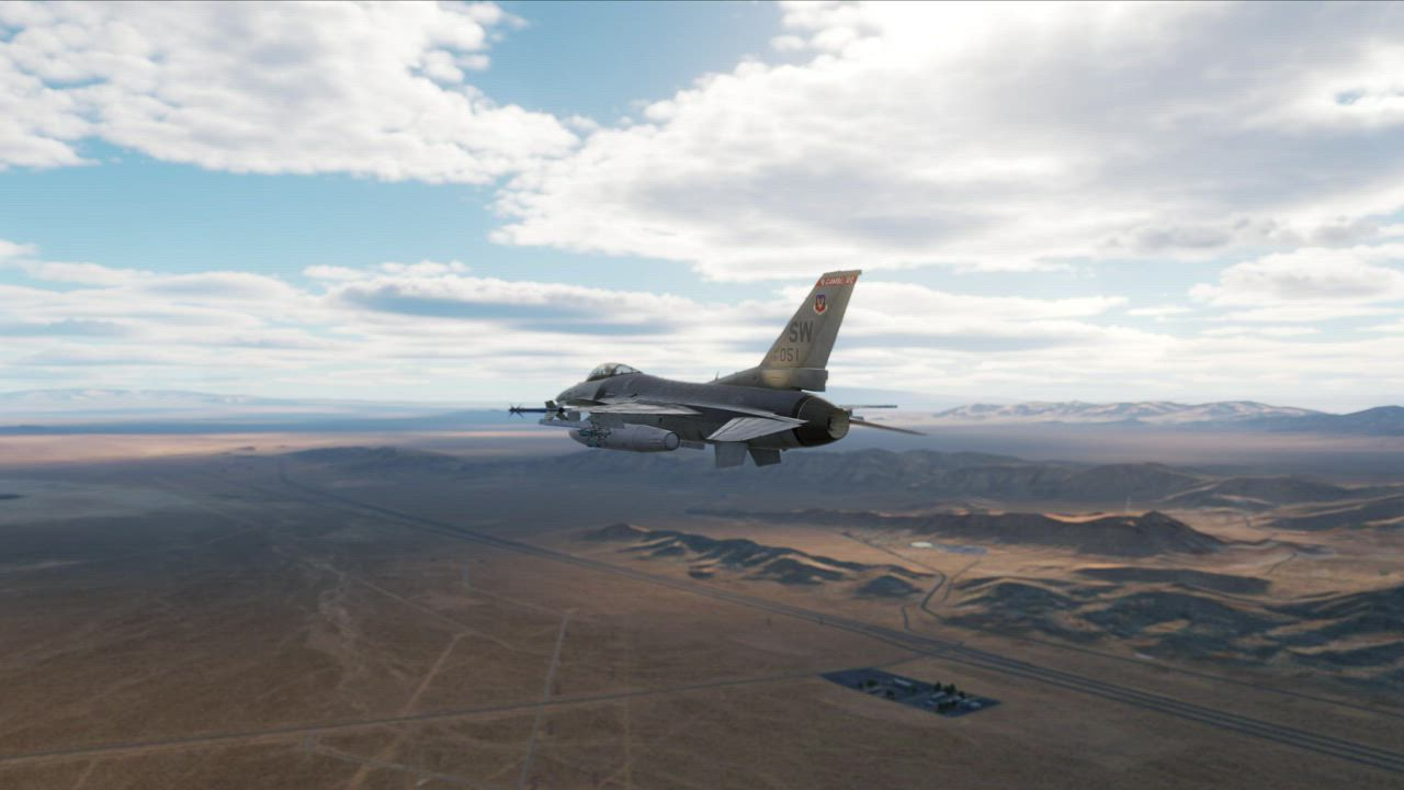 Fighter jet armed with bombs flying over a desert landscape - Free ...