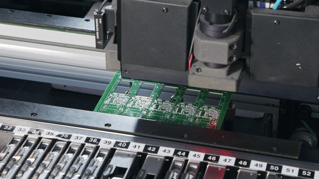 Machine placing circuit board parts - Free Stock Video