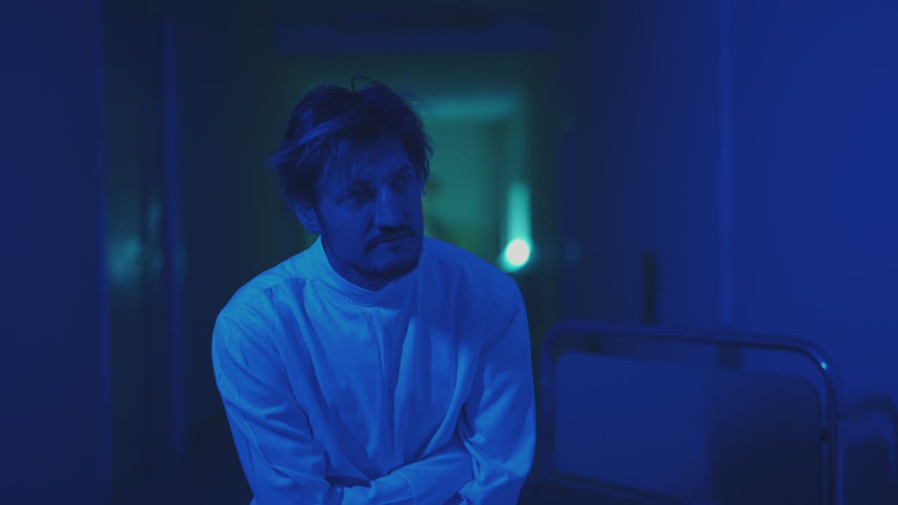 Man in straitjacket in a creepy hospital - Free Stock Video