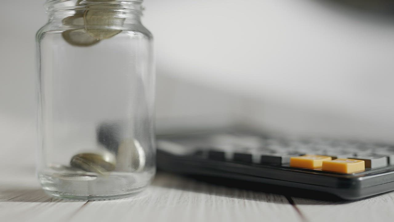 Slow motion of falling coins - Free Stock Video