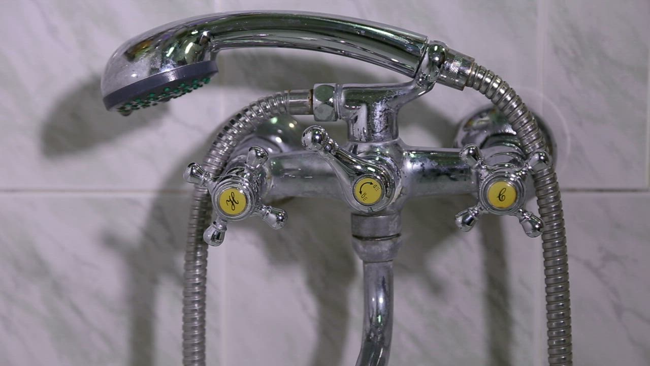 Faucet of a bath and shower dripping - Free Stock Video