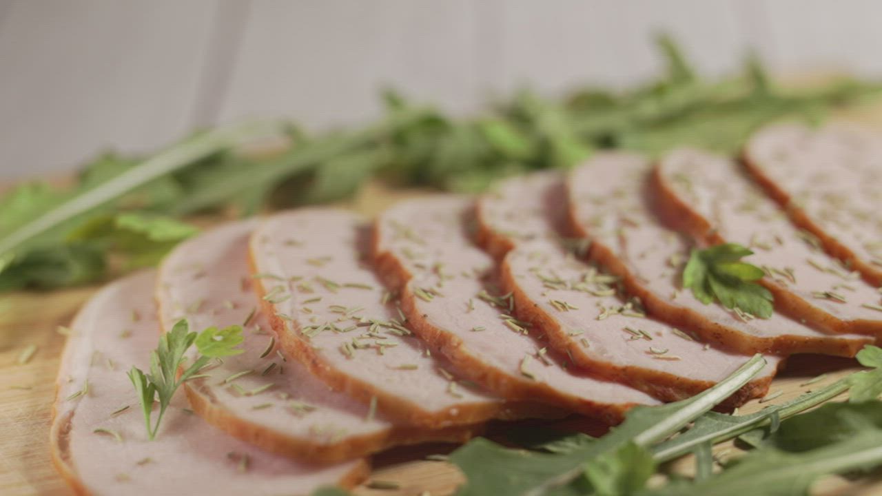 Traditional ham with green spices - Free Stock Video