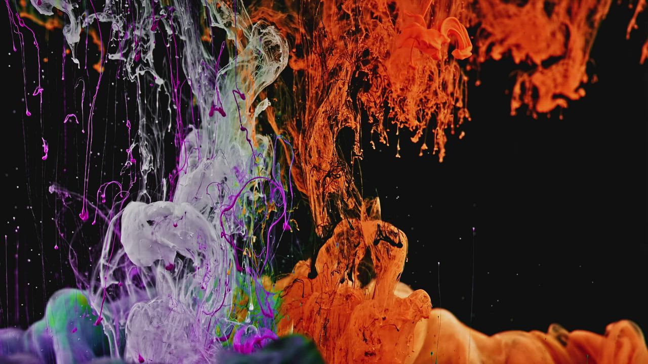 Colorful ink swirling through water against a dark background - Free ...