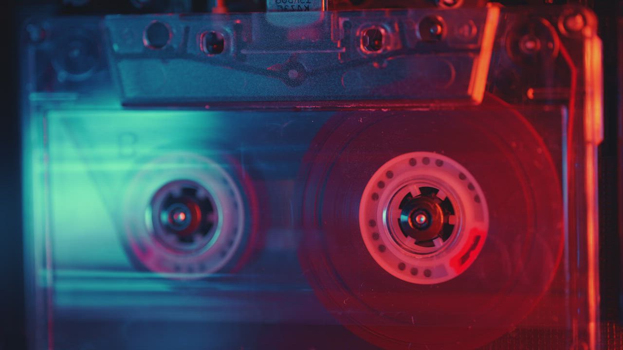 Audio cassette playing with neon lights - Free Stock Video