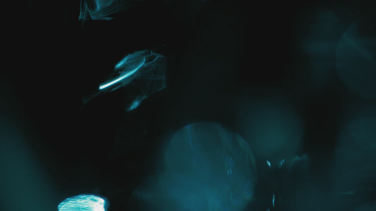 Blue crystal-like light leak overlay - Free Stock Video