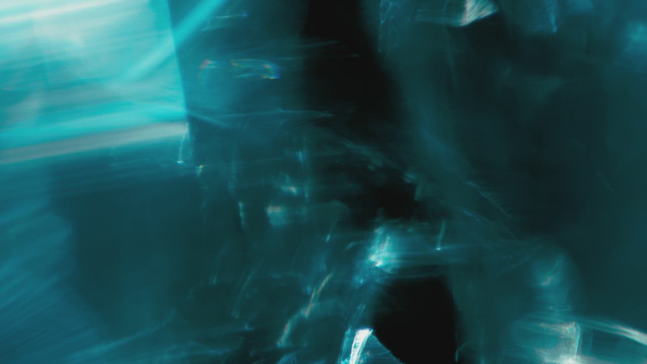Film overlay of dark blue crystal-like light leak - Free Stock Video