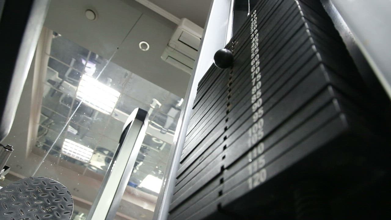 Heavy gym equipment trainer - Free Stock Video