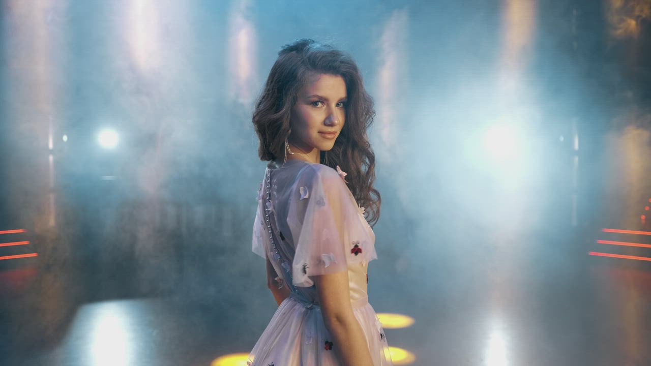 Girl posing on a stage - Free Stock Video