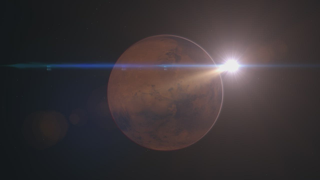 Mars rotating in space around sun - Free Stock Video