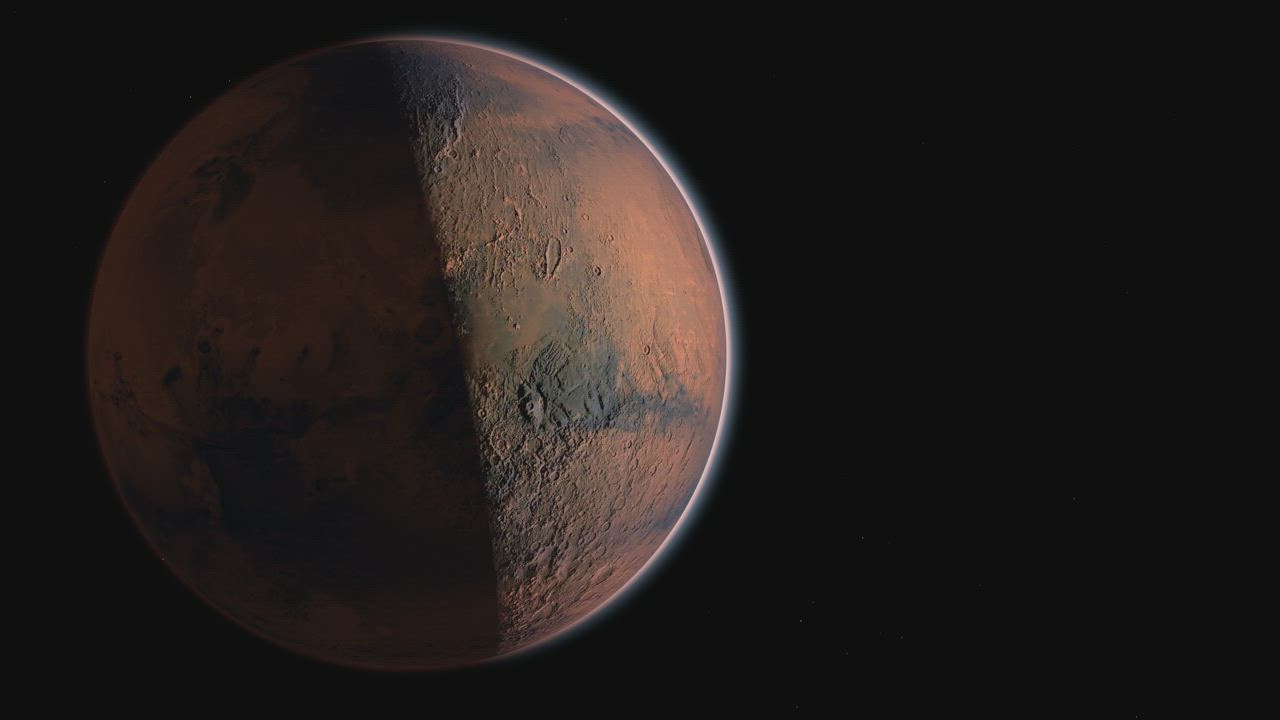 Mars spinning out of shade from sun - Free Stock Video