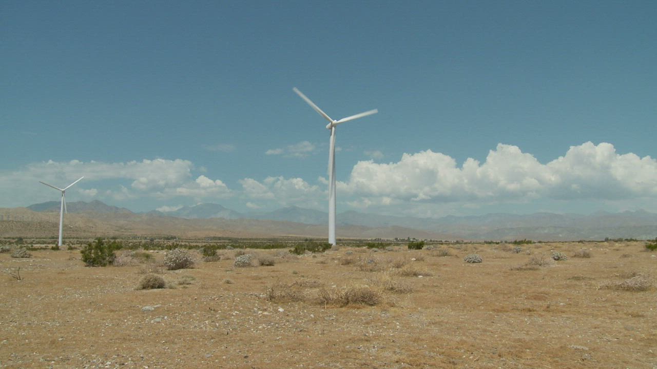 Time lapse of wind powered turbines - Free Stock Video