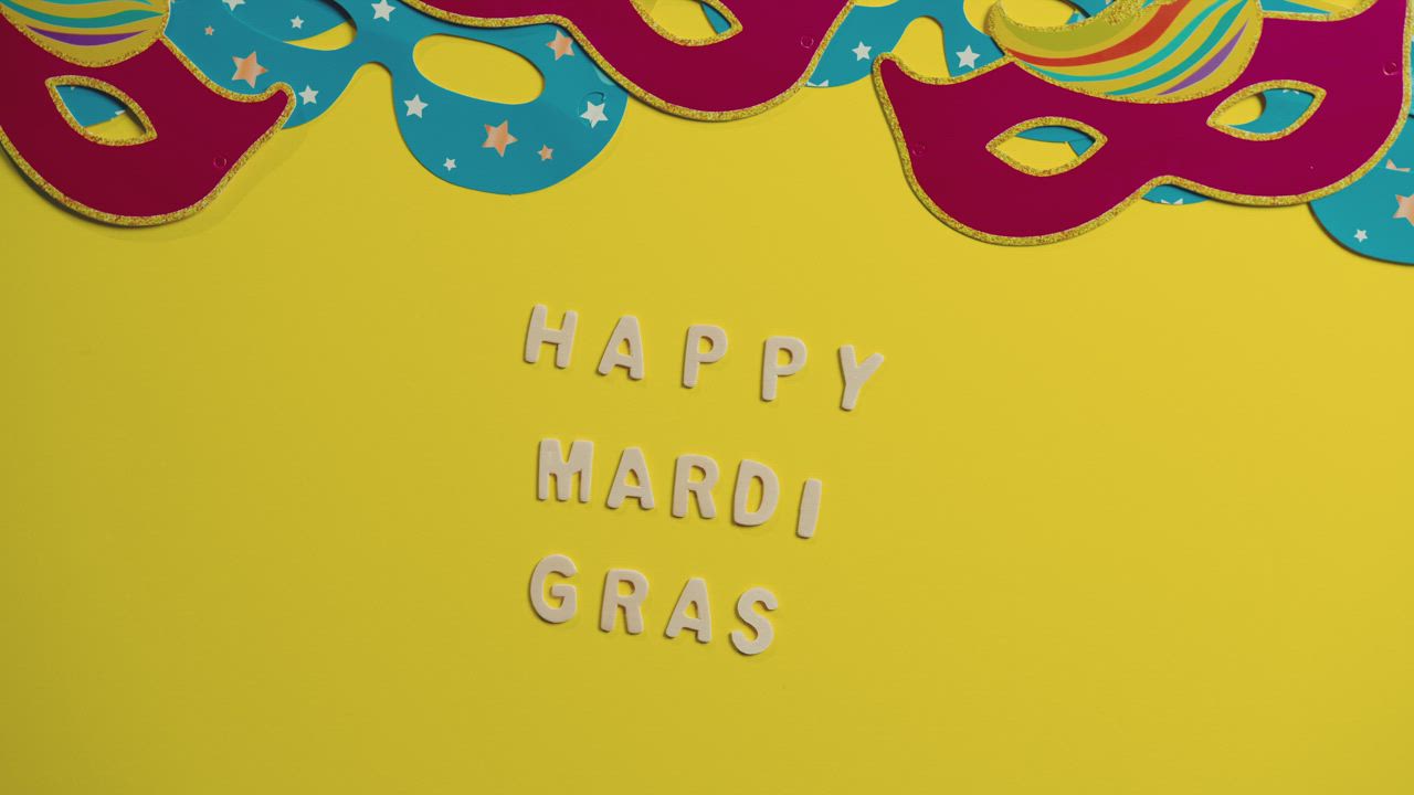 Happy Mardy Gras festive yellow background with the phrase - Free Stock ...