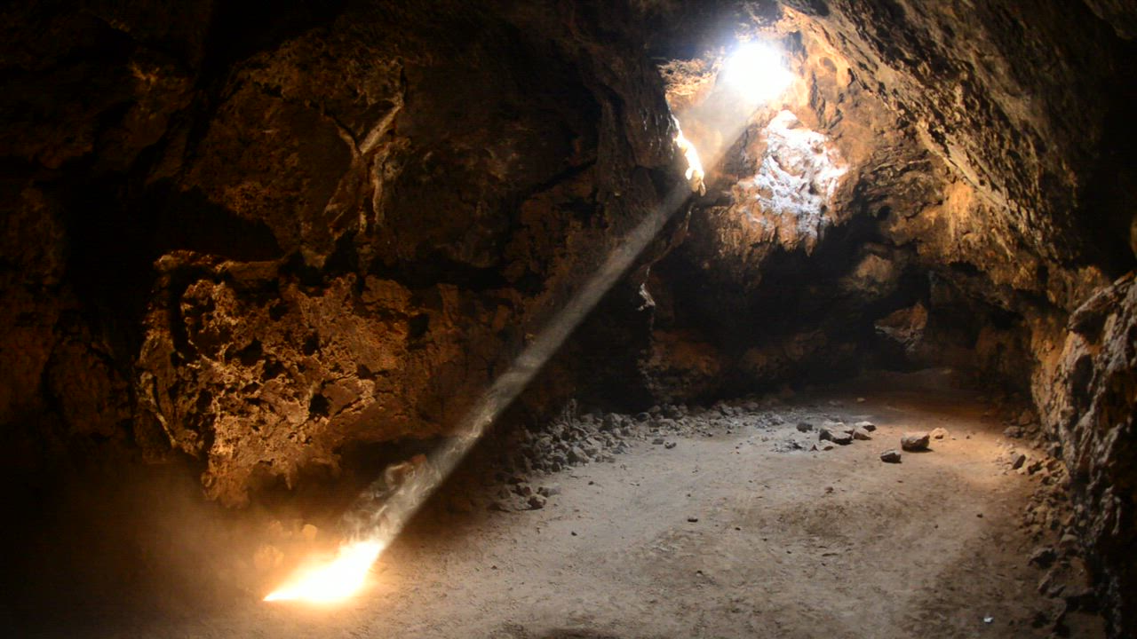 Light ray inside of a cave - Free Stock Video
