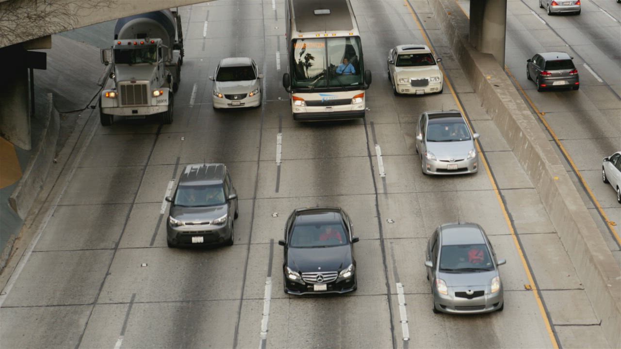 Slow motion of a highway full of cars - Free Stock Video