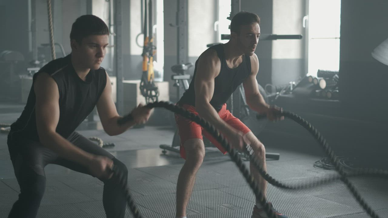 Working hard at the gym - Free Stock Video