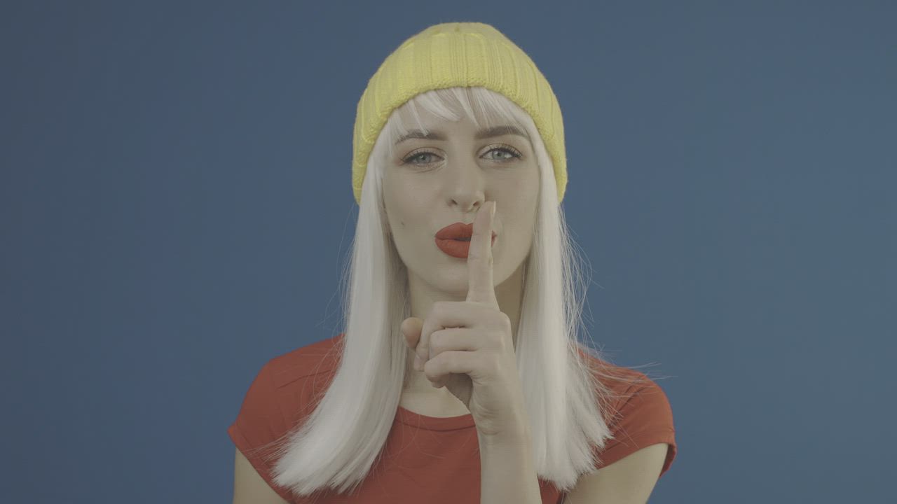 Girl making the silence sign - Free Stock Video