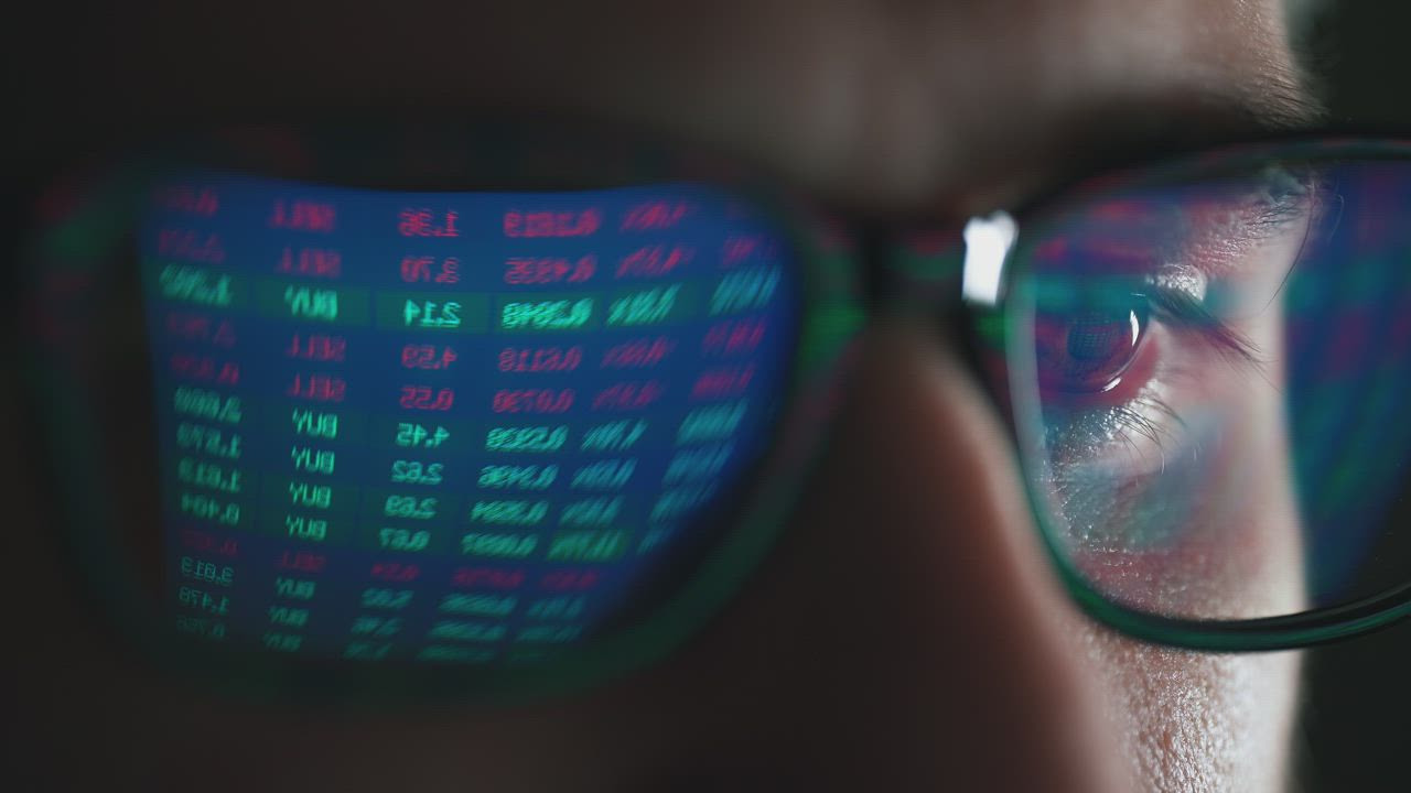 Reflections of digital numbers on glasses - Free Stock Video