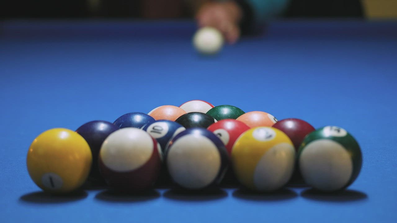 Close up of billiard balls in a game of pool - Free Stock Video