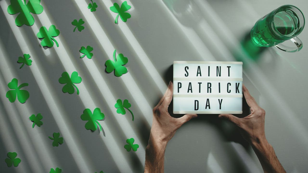 Hands leave a St. Patrick's Day sign on a festive background - Free ...
