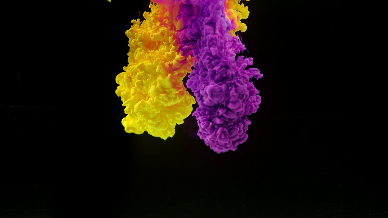 Hypnotic colors falling on the water - Free Stock Video