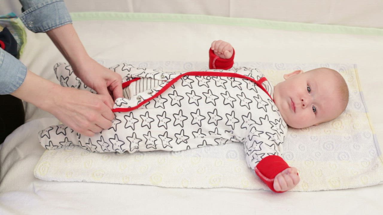 New born being swaddled by their mother - Free Stock Video