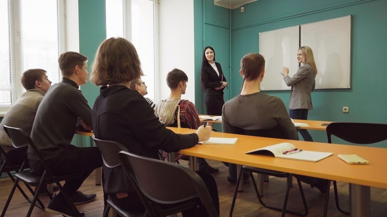 Group of college students working together in a classroom - Free Stock ...
