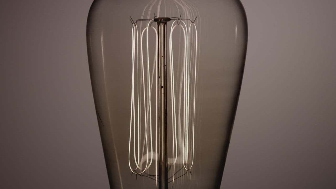 Light bulb filament flickering - Free Stock Video