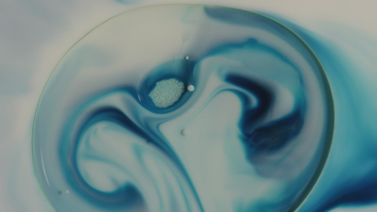 Hypnotic blue coloured liquid - Free Stock Video