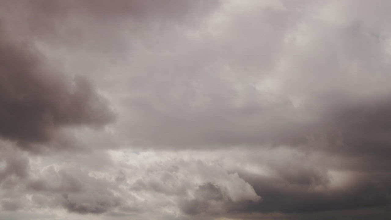 Dark rain clouds moving across the sky - Free Stock Video