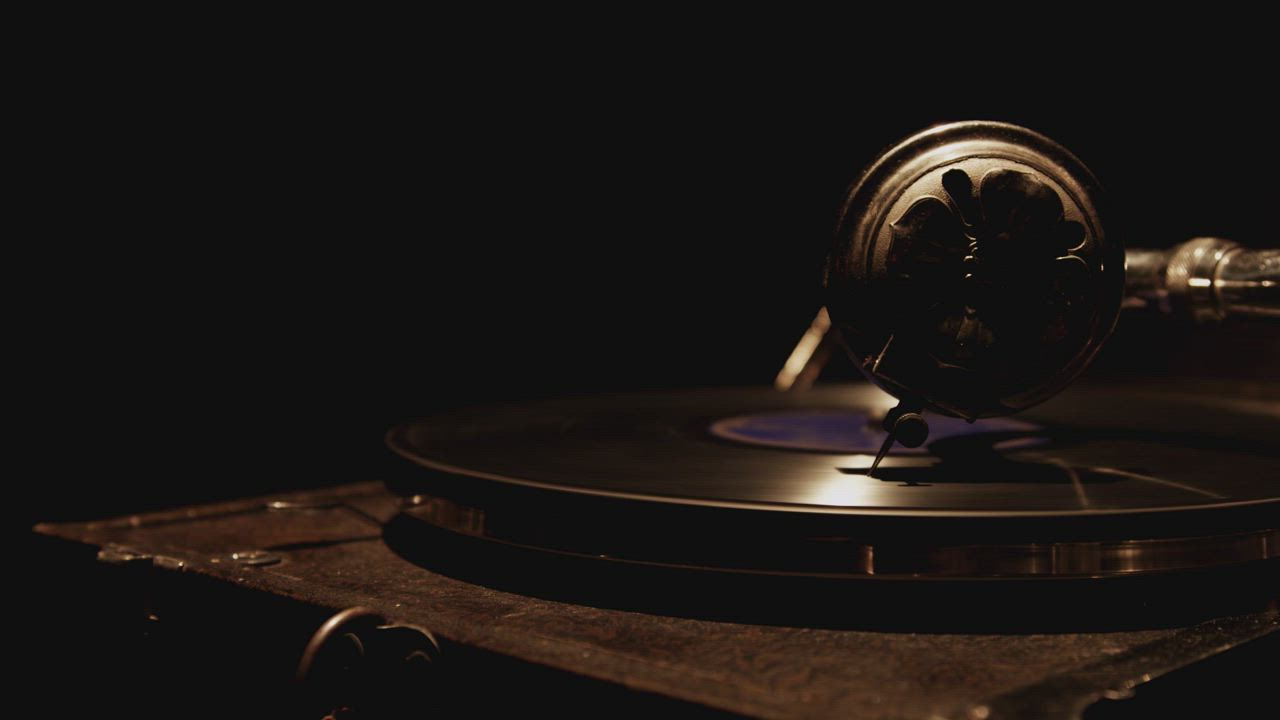 Dark room with antique vinyl record player - Free Stock Video