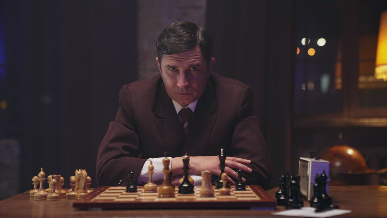 Chess player celebrates his opponent's win - Free Stock Video