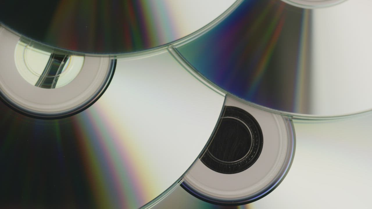 Pile of CD discs close up - Free Stock Video