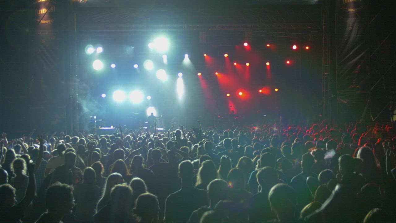 Shot of crowd jumping and waving arms at a show - Free Stock Video