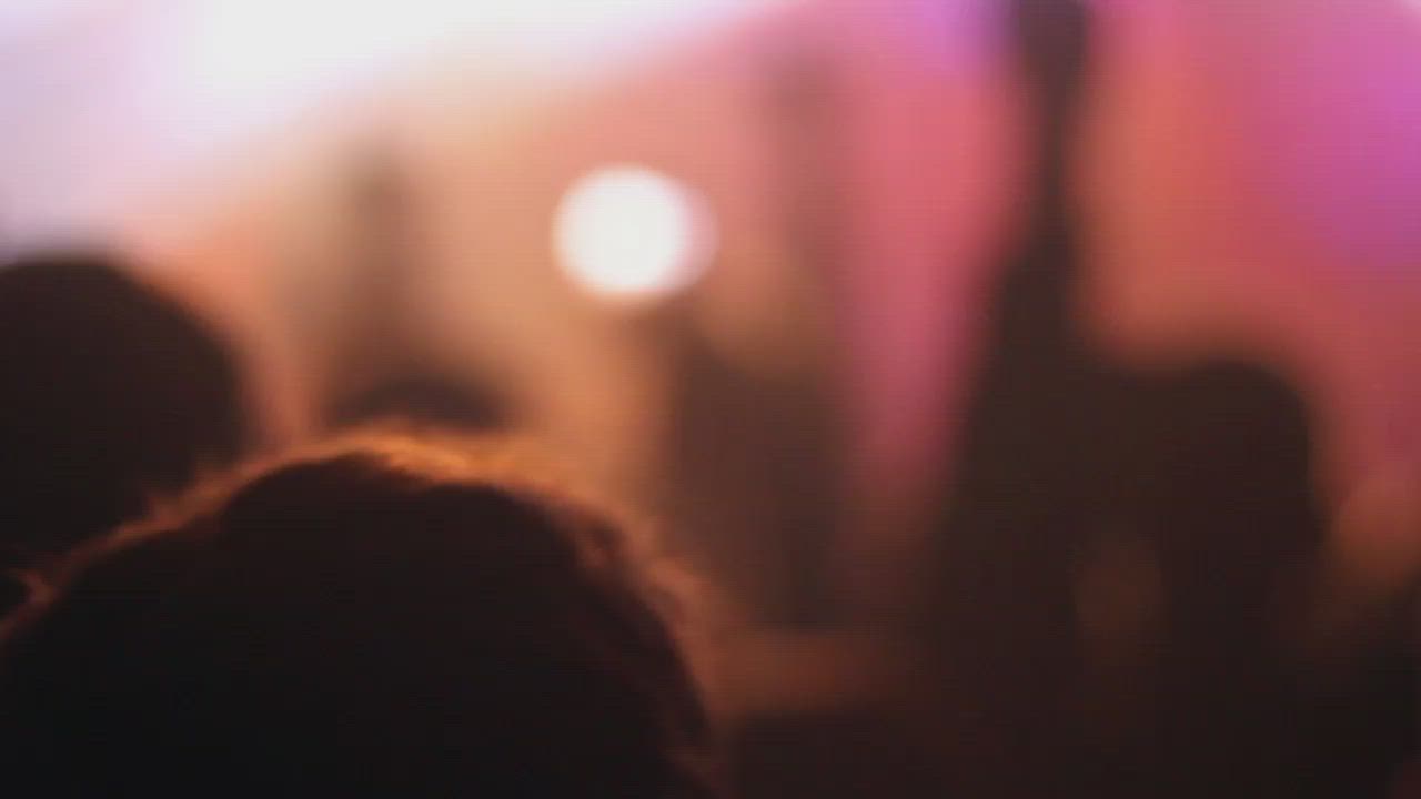 Slow motion close up of crowd at front of concert - Free Stock Video