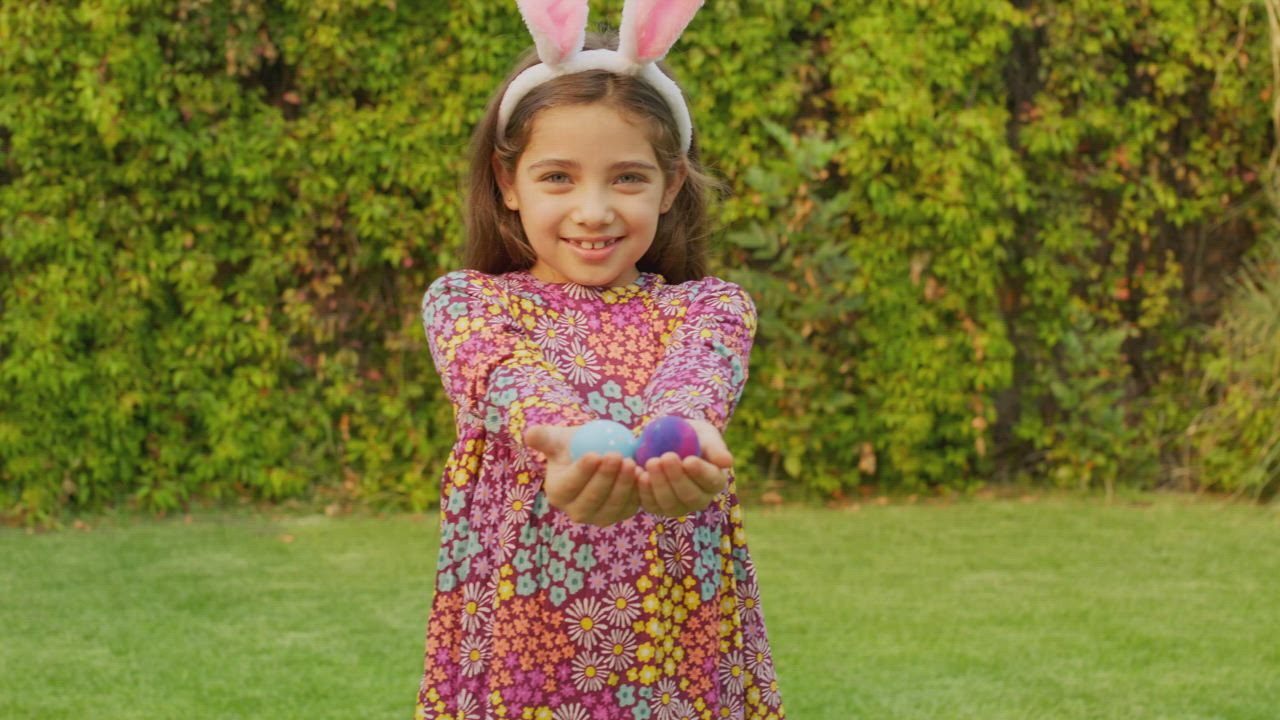 Happy girl shows her Easter eggs - Free Stock Video