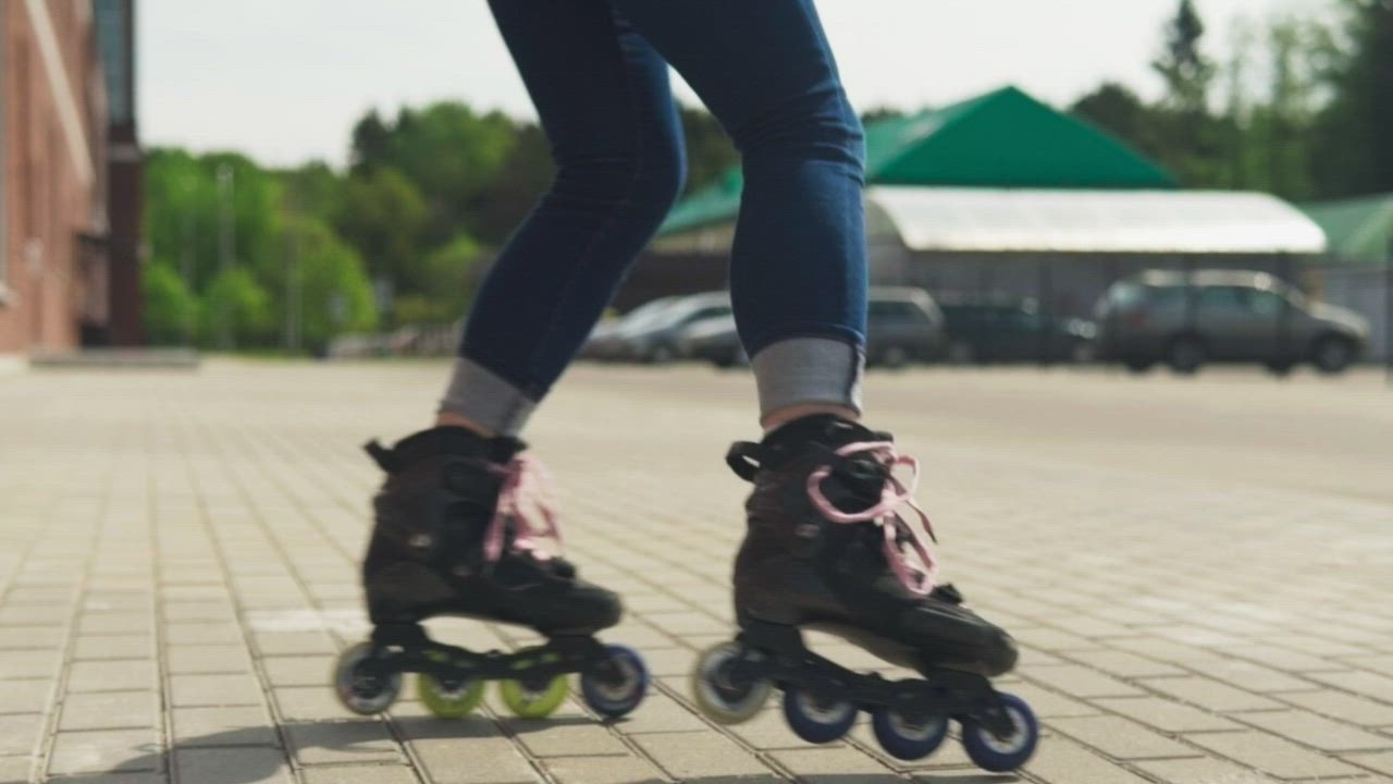Close up of rollerblades being worn - Free Stock Video