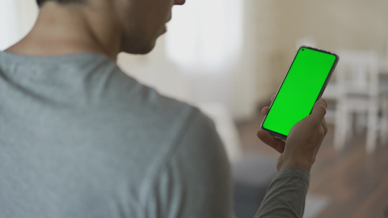 Close up of a person tapping on their smartphone screen - Free Stock Video